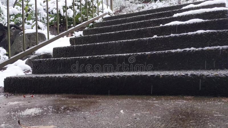 Snow Storm Falling and Covering Stone Steps Outdoors Stock Video ...