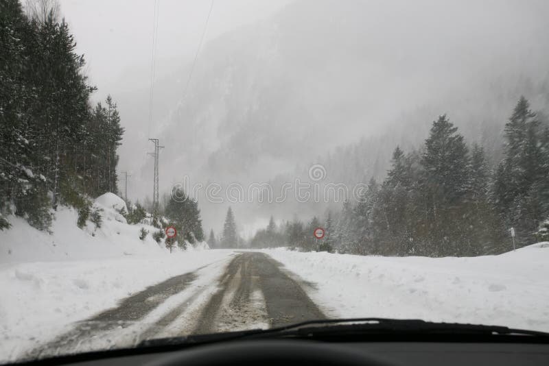 Snow Storm in the Mountain Inside a Car Stock Photo - Image of driving ...