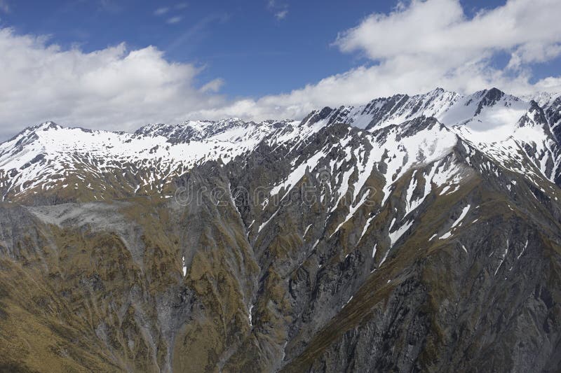 Snow-streaked Mountain Peaks Stock Image - Image of desolate, zealand ...