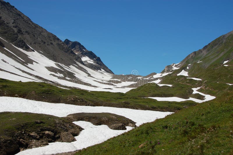Snow in summer stock photo. Image of sunshine, green - 10832194