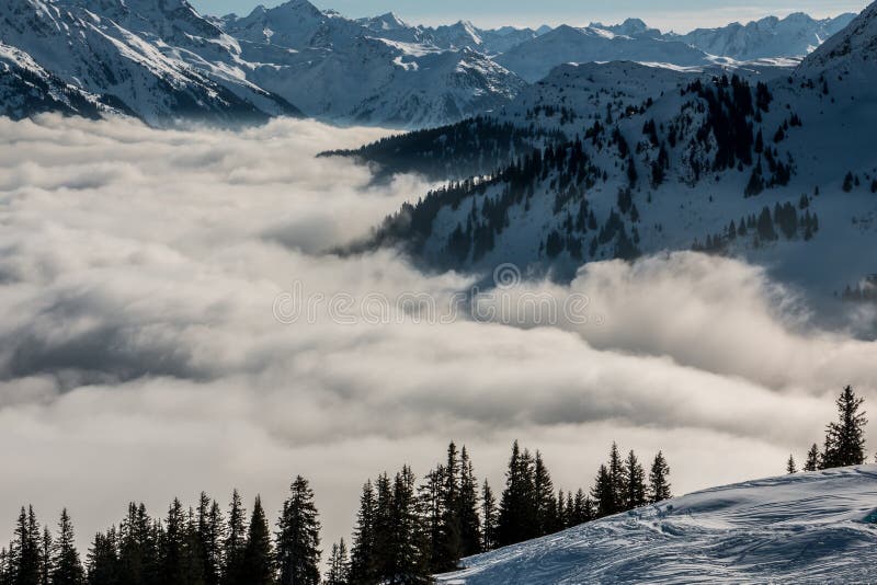 Snow on the Top of the Mountains and Fog Down the Valley Stock Photo ...