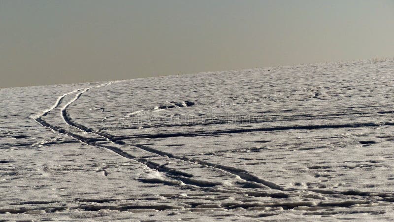 Snow track stock image. Image of field, shadow, shadows - 84944313