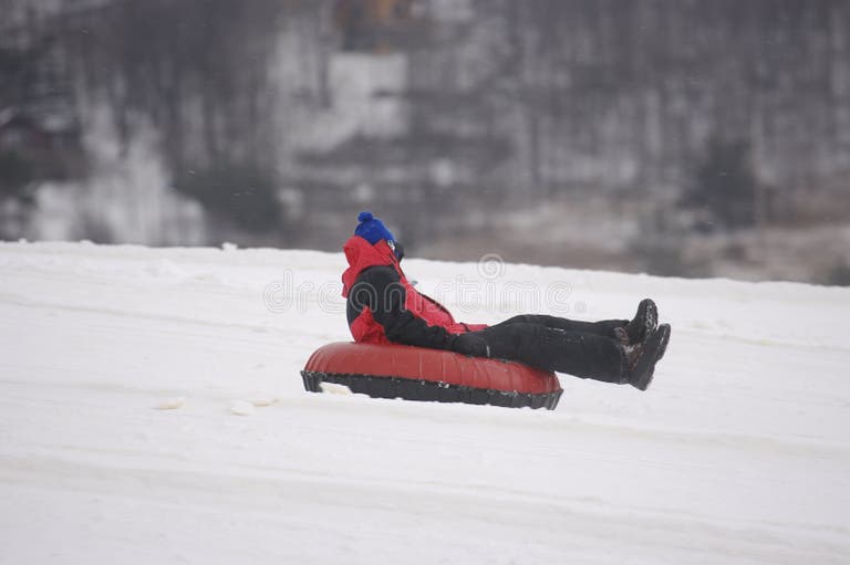 Snow Tubing stock photo. Image of modern, pink, tube, sledding - 694114