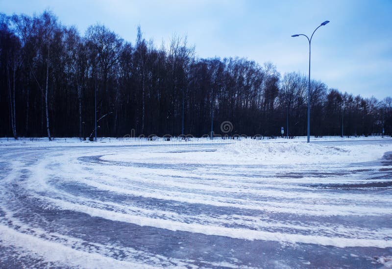 Snow Wheel Trails at Empty Winter Car Parking Backdrop Stock Image ...