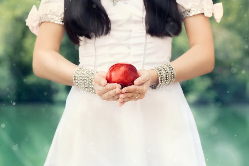 Snow White Princess with the Famous Red Apple Stock Image - Image of ...