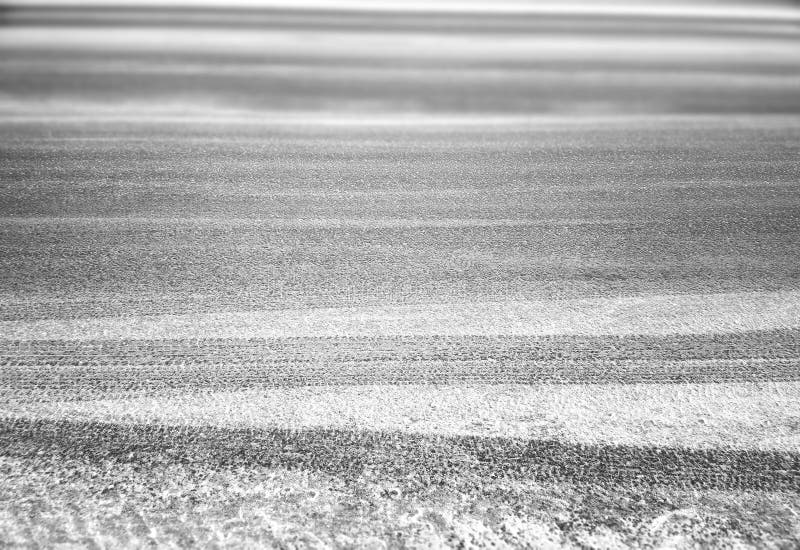 Snow on the Winter Road with Wheel Traces Background Stock Photo ...