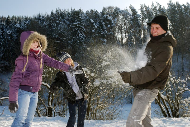 Snowball fight stock image. Image of smile, blue, couple - 17351367