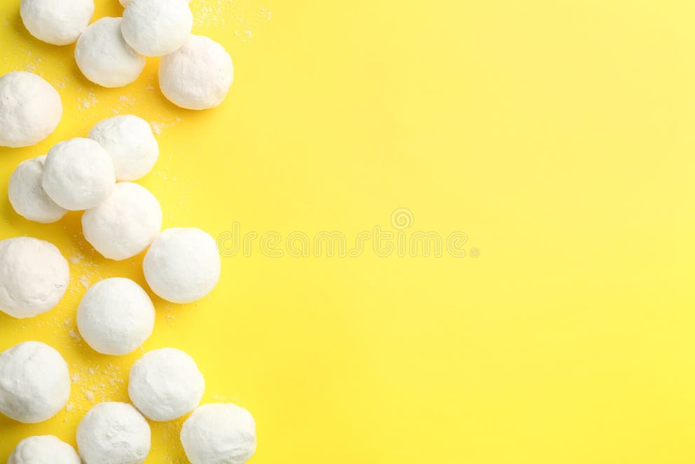 Snowballs on Yellow Background, Flat Lay. Space for Text Stock Image ...