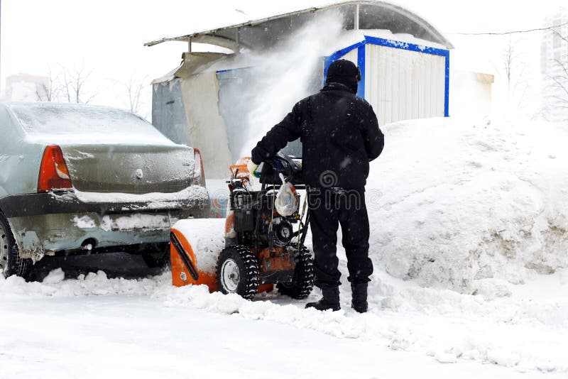 Snowblower in city stock photo. Image of snowfall, chill - 13274818
