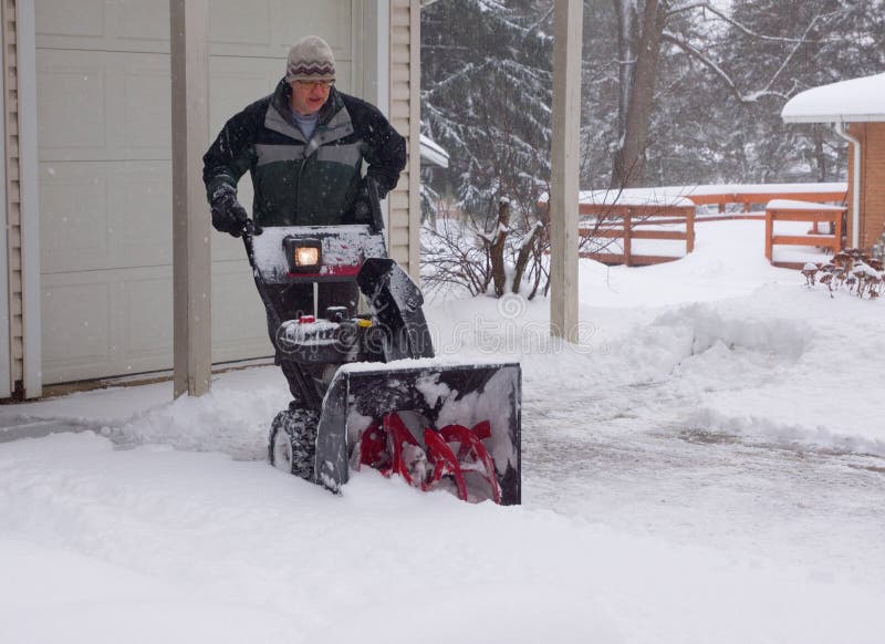 Snowblower Man Moving the Blower Stock Photo - Image of snowfall ...