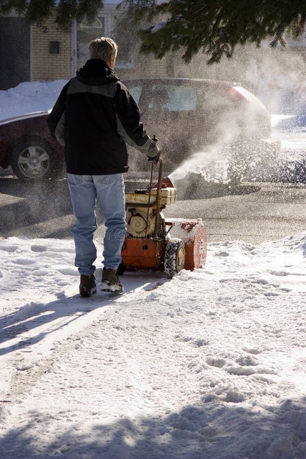 Snowblowing the Driveway stock image. Image of storm, cold - 8041777