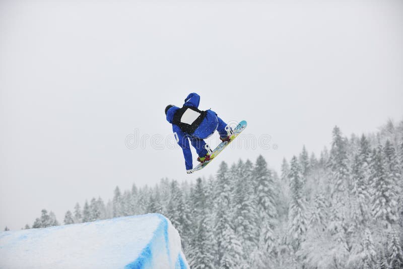 Snowboard jump stock photo. Image of slope, jumping, jump - 13023512