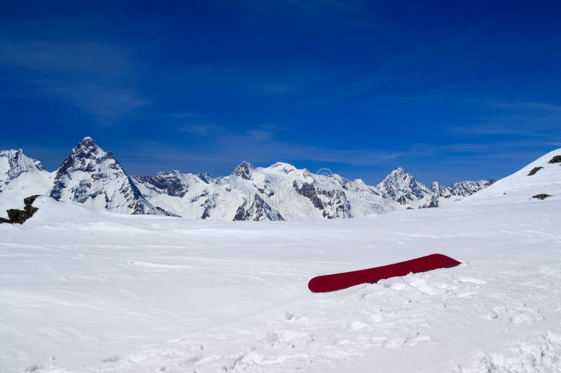 Snowboard on the ski slope stock image. Image of peak - 16035495