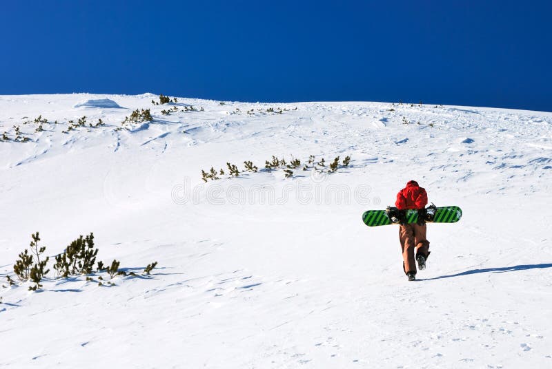 Line of People Ascending a Slope on Skies Stock Image - Image of ...