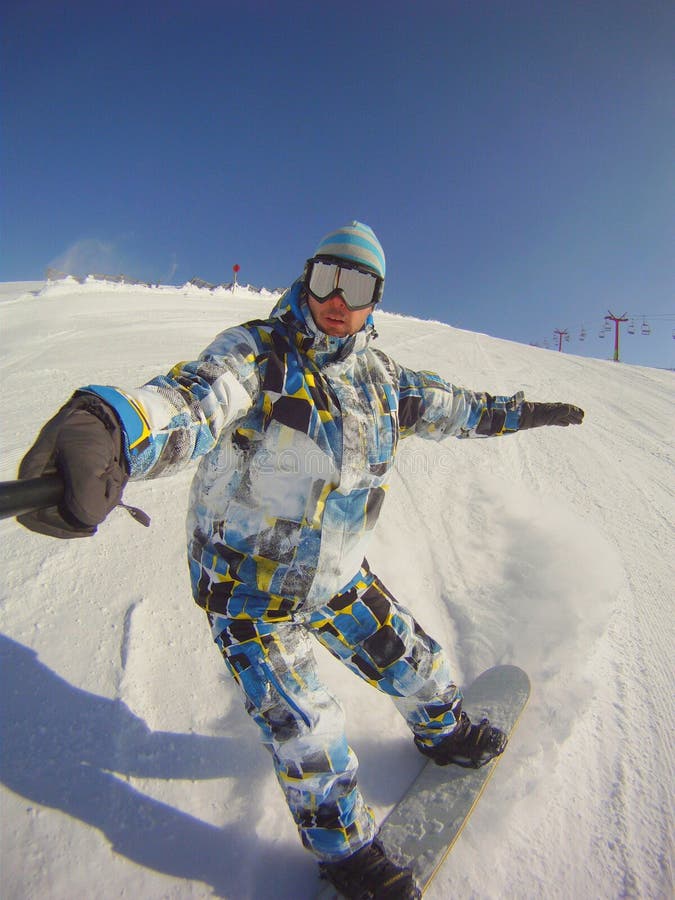 Snowboarder Gliding Down the Slope Stock Image - Image of cold ...