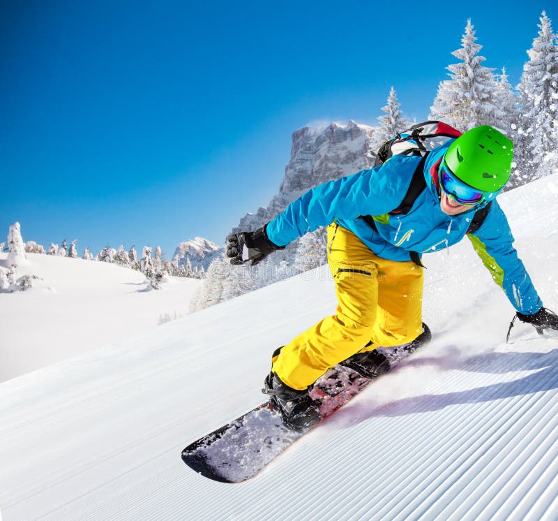 Snowboarder Going Downhill in High Mountains Stock Photo - Image of ...