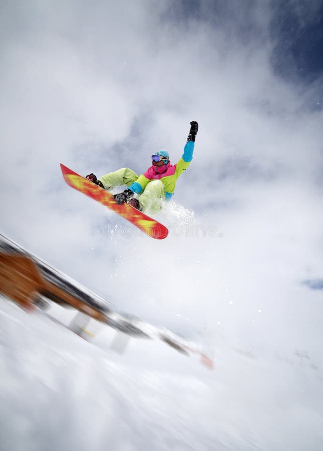 Snowboarder Jumping and Sun Stock Image - Image of freeze, skier: 213529