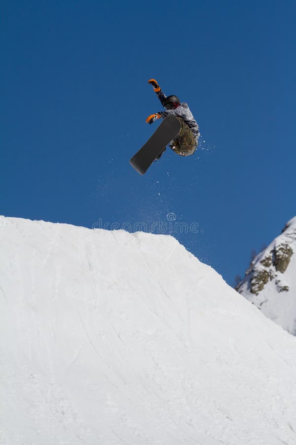 Snowboarder Jumps in Snow Park, Ski Resort Stock Image - Image of ...