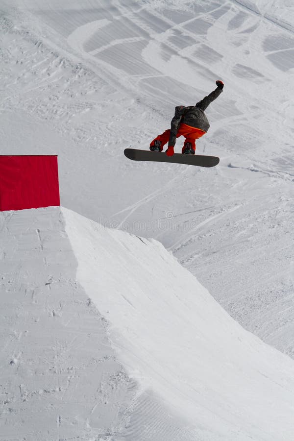 Snowboarder Jumps in Snow Park, Ski Resort Stock Photo - Image of board ...