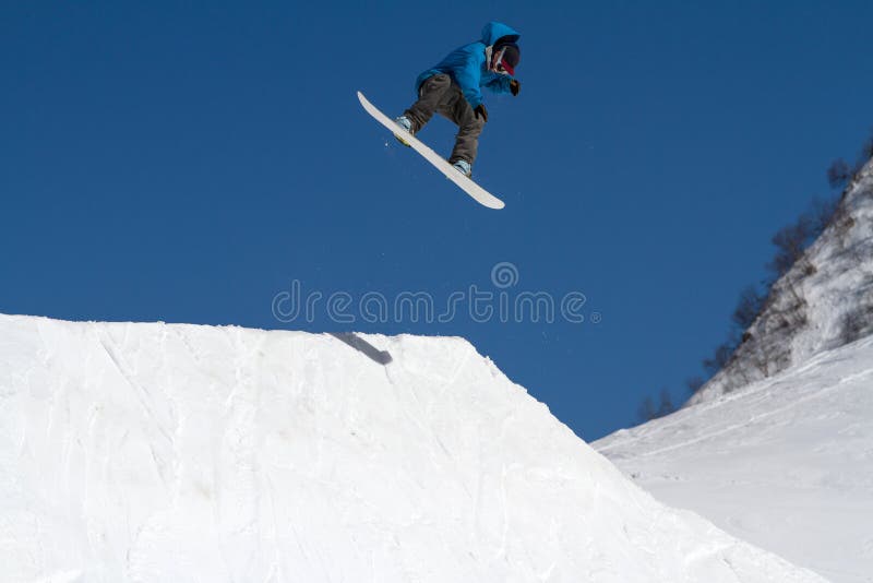 Snowboarder Jumps in Snow Park, Ski Resort Stock Photo - Image of ...