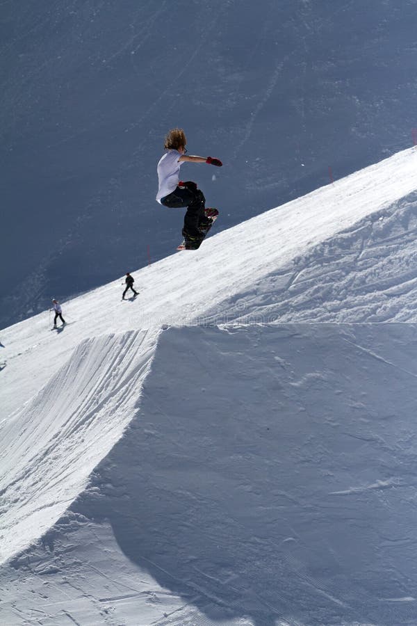Snowboarder Jumps in Snow Park, Ski Resort Editorial Photo - Image of ...