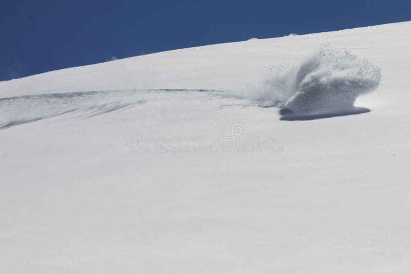 Snowboarder Turning on Fresh Powder Snow Creating a Snow Wave Stock ...