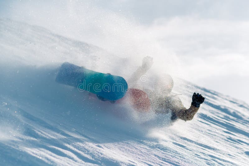 Snowboarder is Riding from Snow Hill and Fall Down Stock Photo - Image ...
