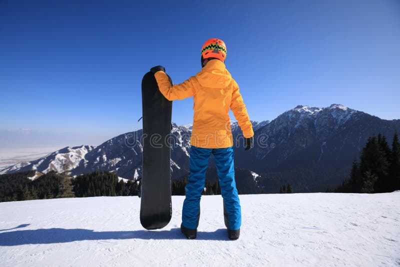 Snowboarder with Snowboard on Winter Mountain Top Stock Image - Image ...