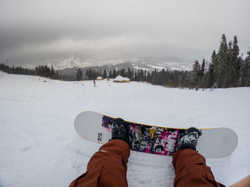 Snowboarding Down a Snowy Mountain Slope Stock Image - Image of ...