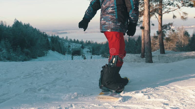 Snowboarding - a Man with Prosthetic Leg Standing on the Board ...