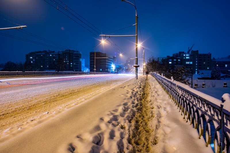 Snowbound bridge at night stock image. Image of outdoor - 134842915