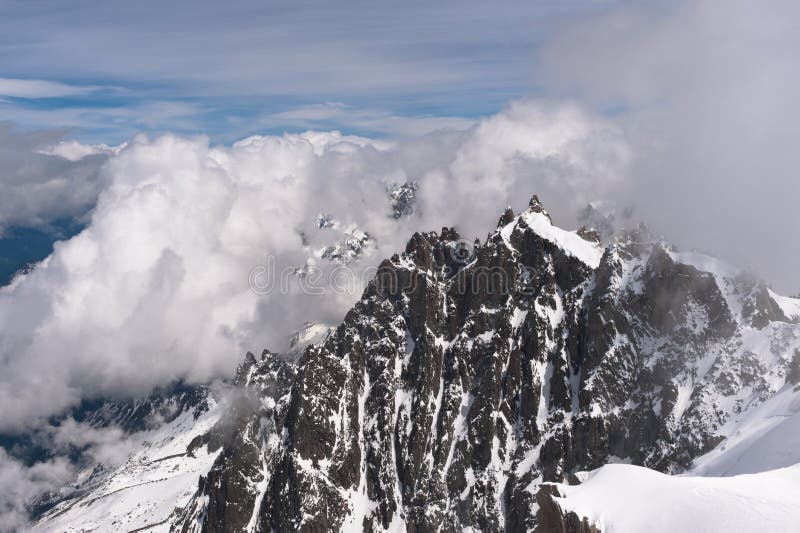 Dramatic View of Snowy Sheer Mountain Cliff in Alaska. Stock Photo ...