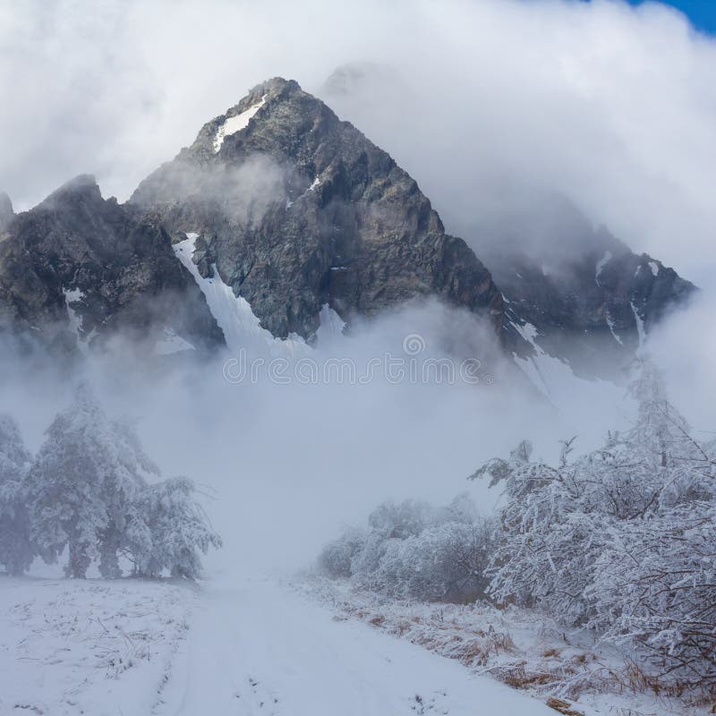 Mountain Valley in Dense Mist and Clouds Stock Photo - Image of stone ...
