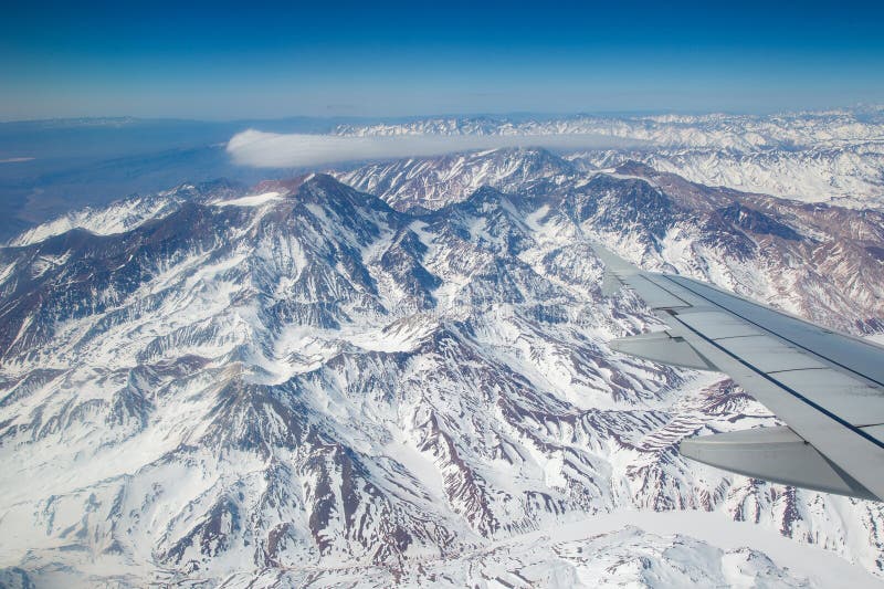 Snowcaped Andes Mountains from the Airplane Window, Chile Stock Image ...