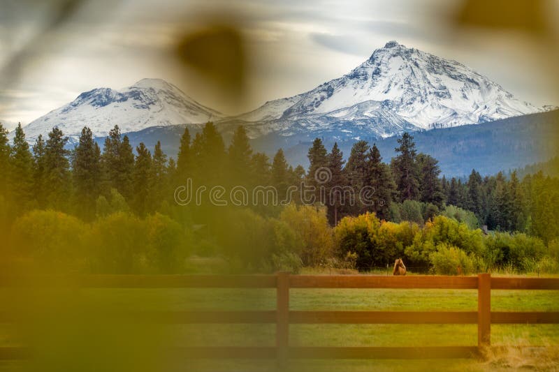 The Snowcapped Sisters Mountains in the the Cascades Mountain Range in ...
