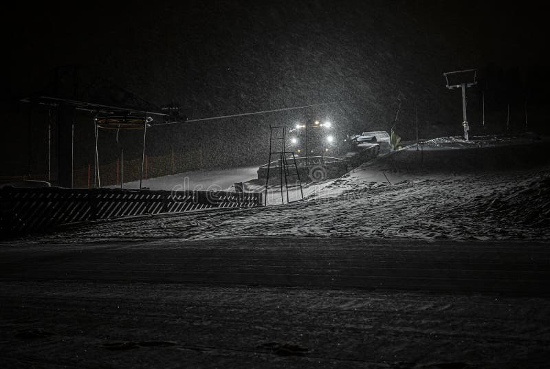 Snowcat Preparing a Slope at Night Stock Image - Image of snowy, power ...