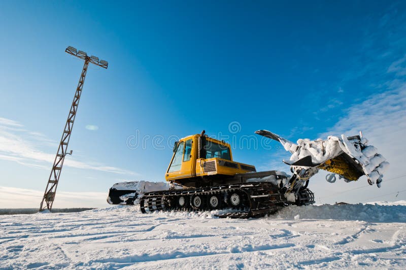 Snowcat on Top of the Mountain Stock Photo - Image of mountains, blue ...