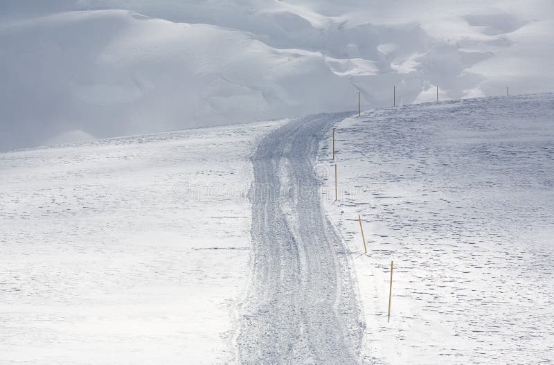 Snowcat tracks on hillside stock image. Image of marks - 4701085