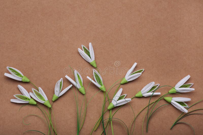 Snowdrops Make in Quilling Art Isolated on Brown Background Stock Photo ...