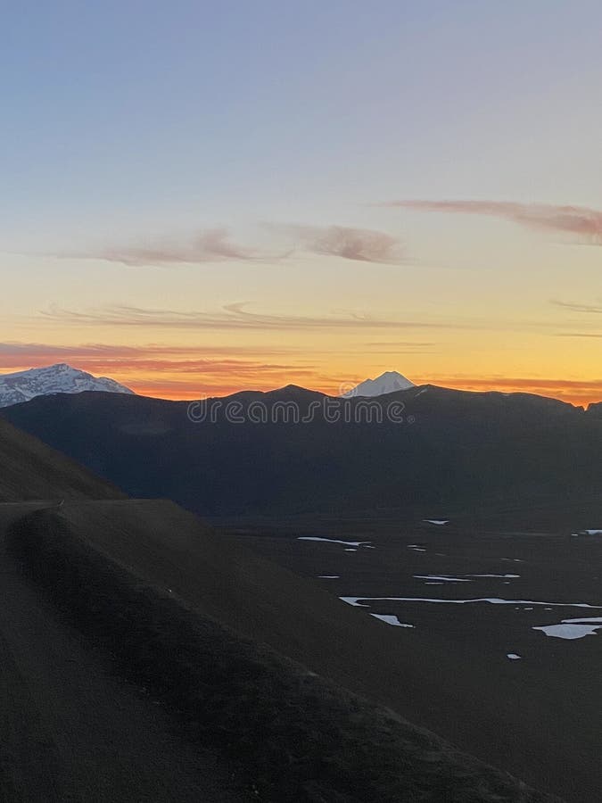 Snowed Landscape in the Big Volcano Stock Image - Image of sunset, alps ...