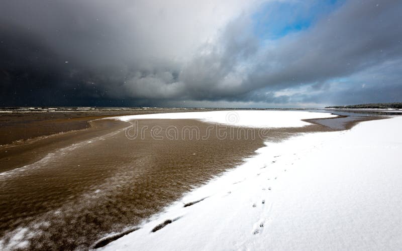 Snowfall Near Sea in Winter with White Waves Crushing Stock Photo ...
