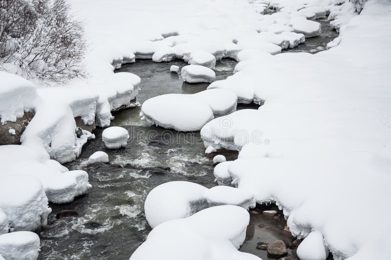 Snowfall on the river. stock photo. Image of season, park - 65697702