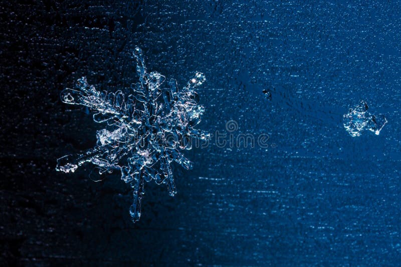Snowflake and a Broken Piece of it Stock Image - Image of glass ...