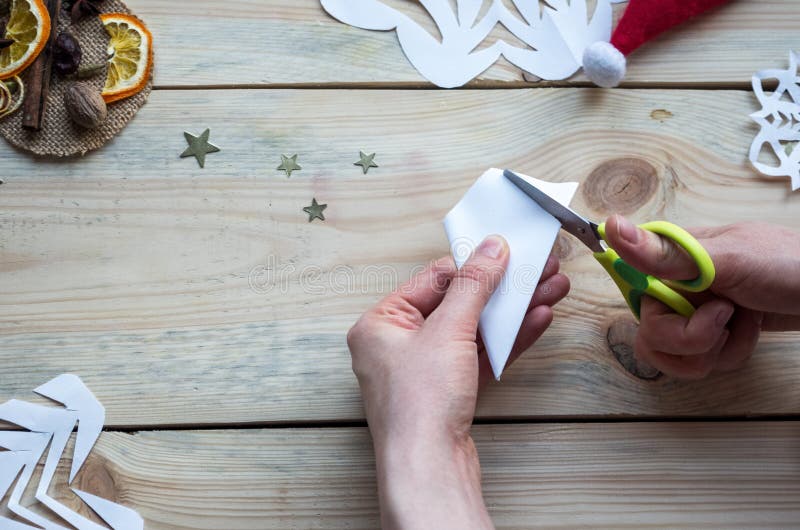 A Snowflake Made from Paper with Your Own Hands Gracefully Decorates a ...