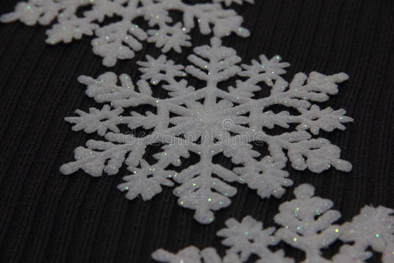Snowflake White Decorative Elements on the Grey Textile Fabric Stock ...