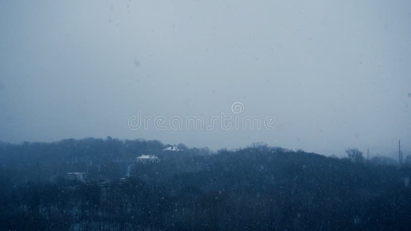 Snowflakes Fall from the Sky on the Background of a Residential ...