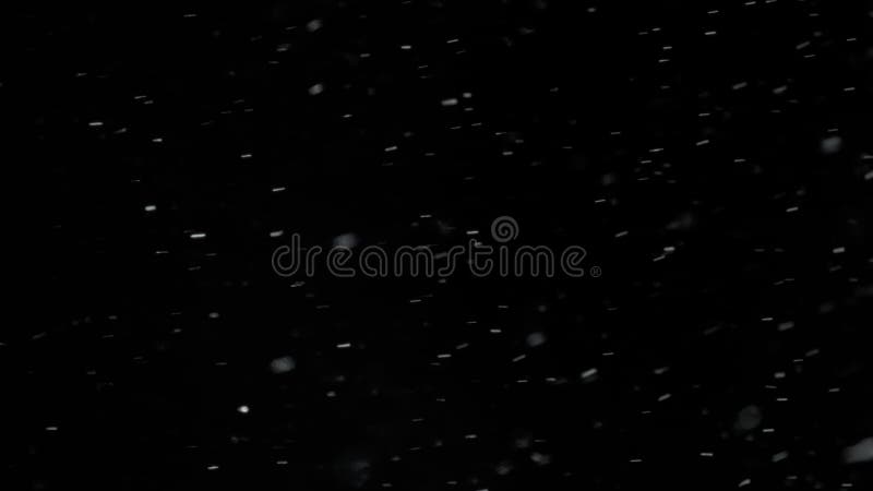 Snowflakes Falling Sideways To the Left in Front of a Black Screen ...