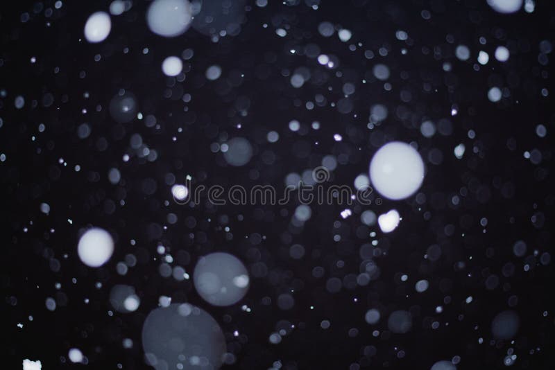 Snowflakes at night stock photo. Image of night, grain - 65508422