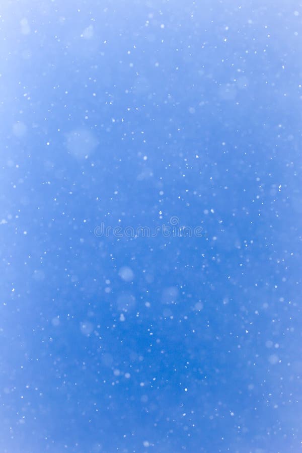 Snowing on a blue sky stock image. Image of flakes, slope - 101919641