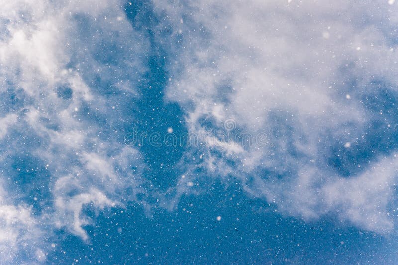 Snowing Light Blue Sky with Light Clouds Stock Image - Image of light ...